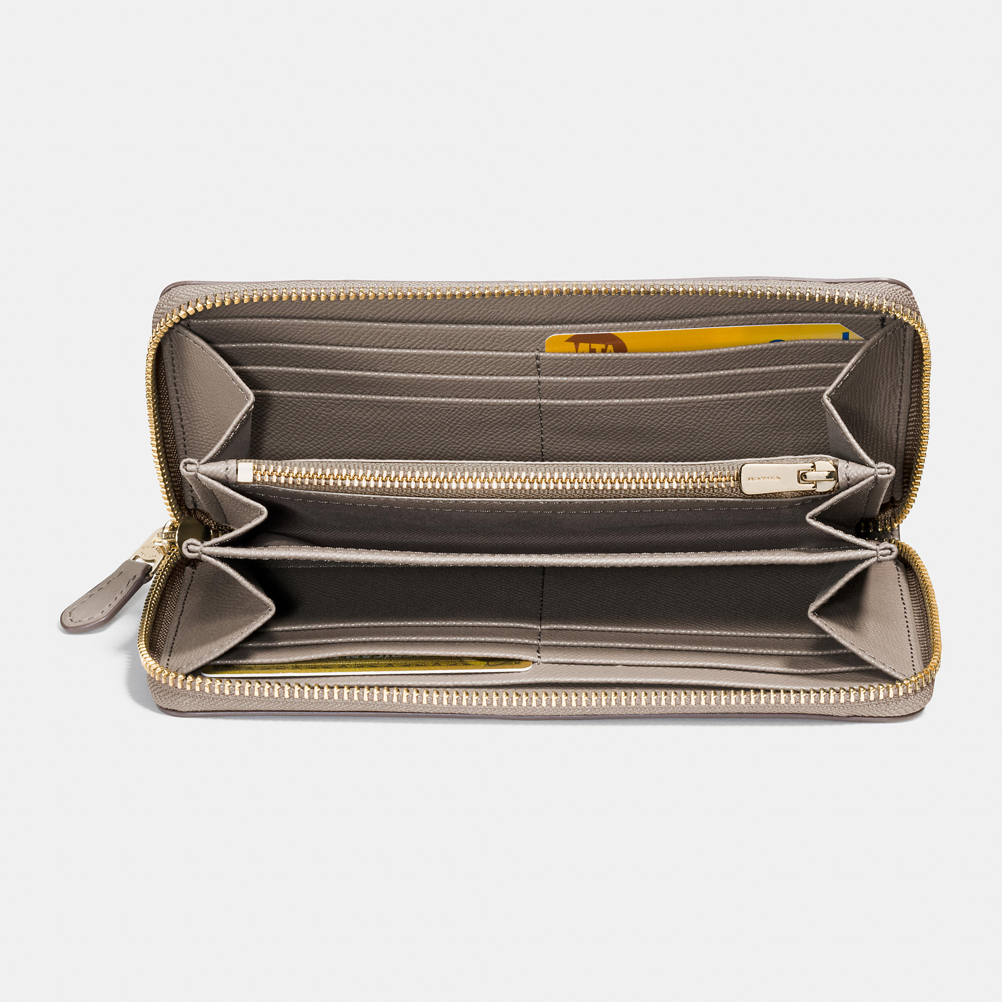 Famous Brand Coach Accordion Zip Wallet In Signature Embossed Leather ...